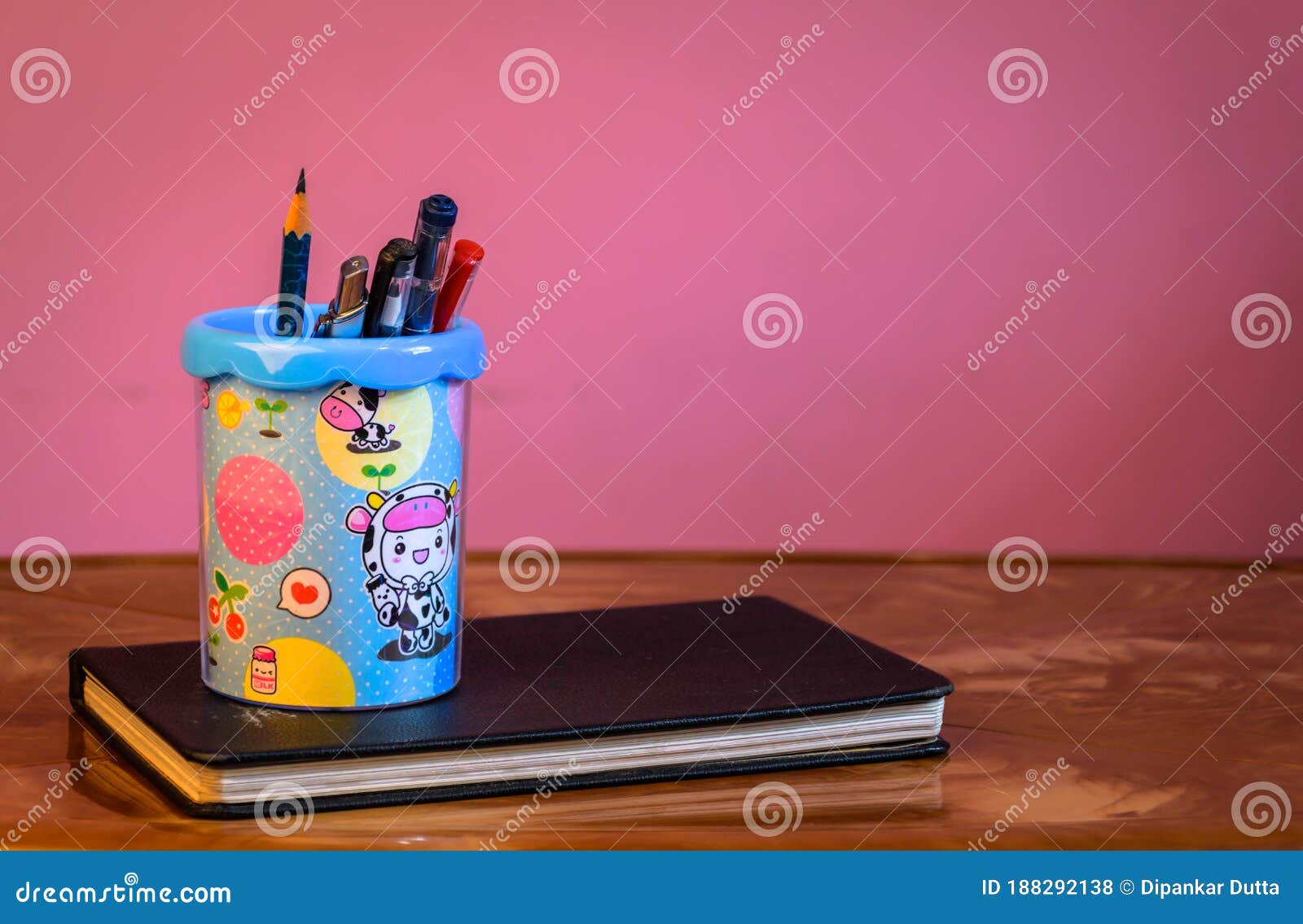 Pen Stand with Diary with Pink Background Stock Photo - Image of diary ...