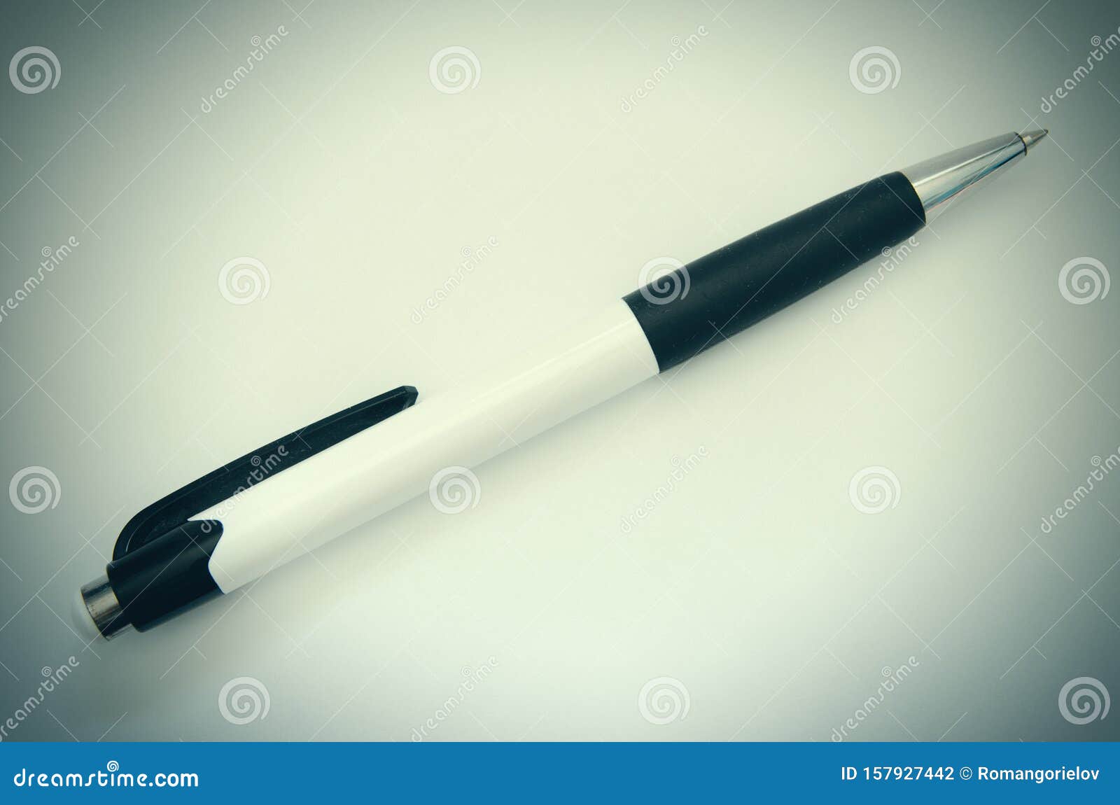 Pen on a table stock photo. Image of stationery, office - 157927442