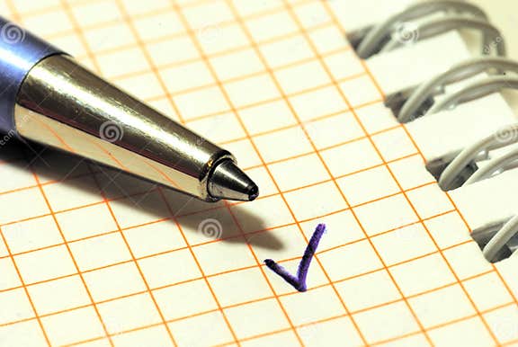 A pen and a tick mark stock photo. Image of approve, check - 12495580