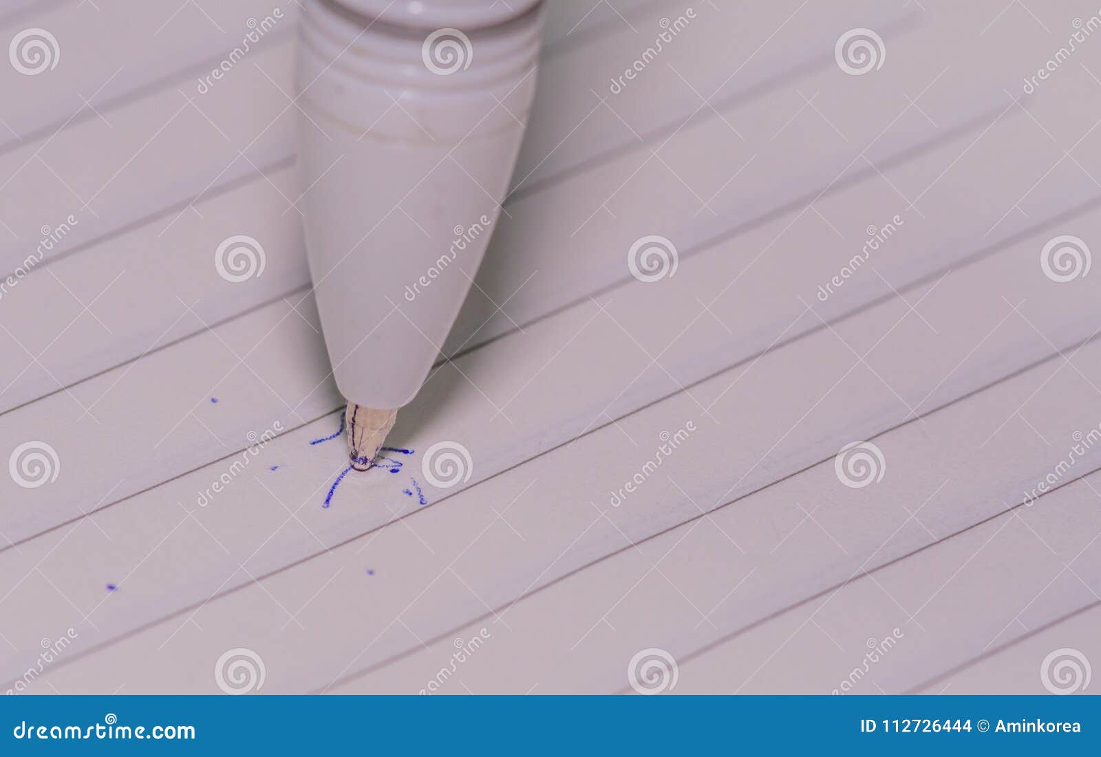Pen Tip on Lined White Paper Stock Photo - Image of macro, design ...