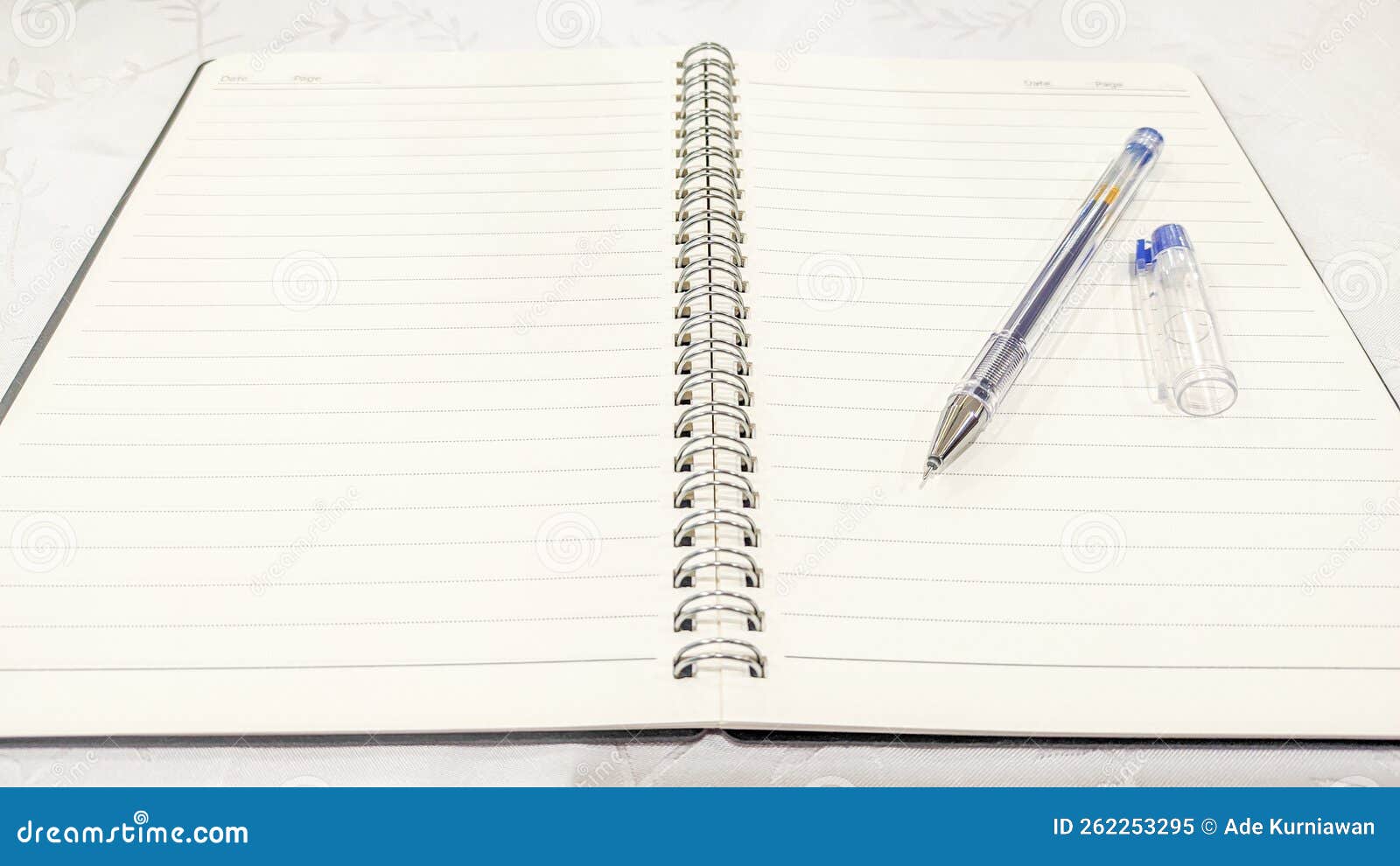 The Pen on Top of the Notebook. a Notebook that is Open on Both Sides ...