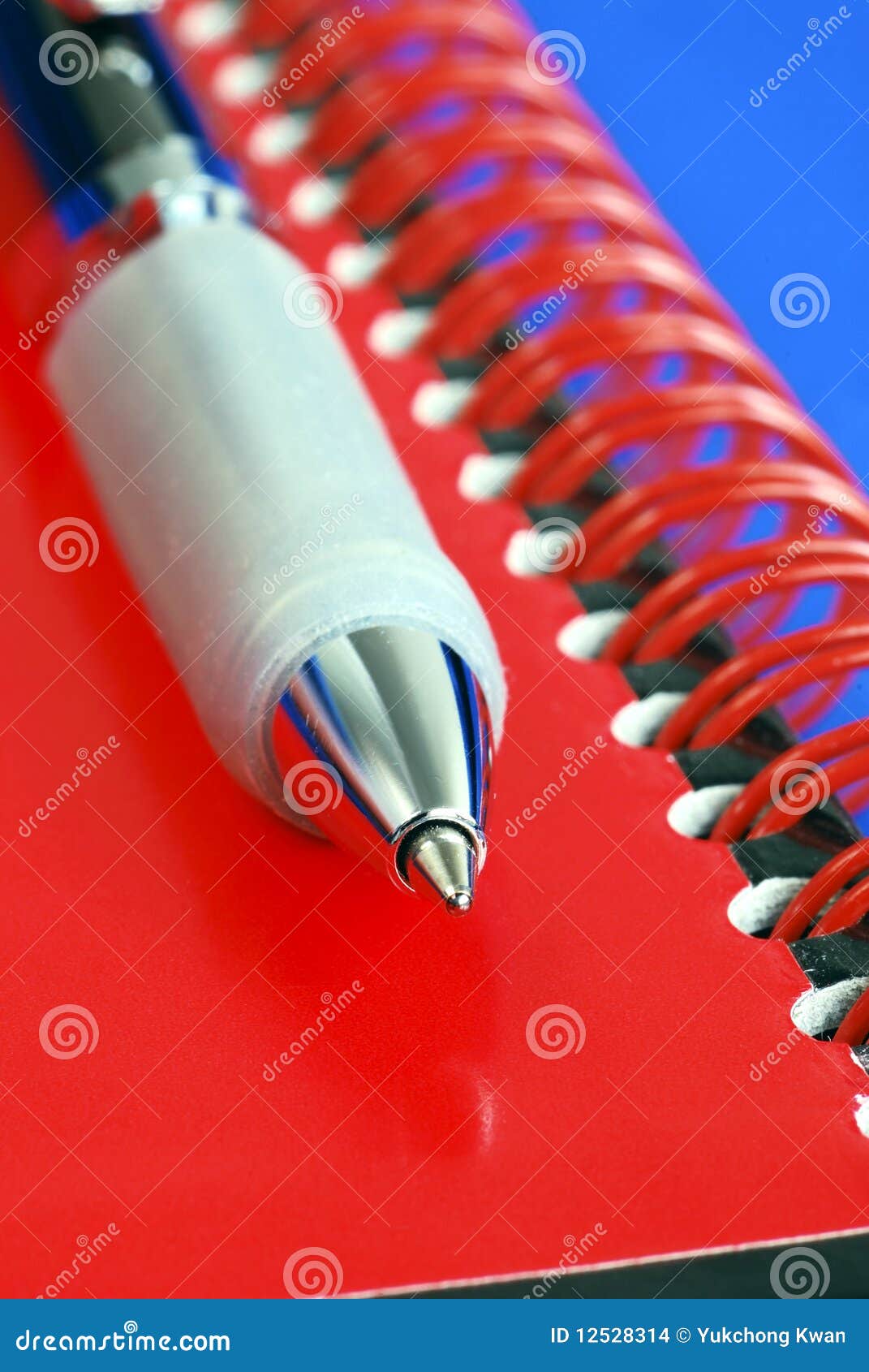 A Pen on the Top of a Red Note Book Stock Photo - Image of notepad ...