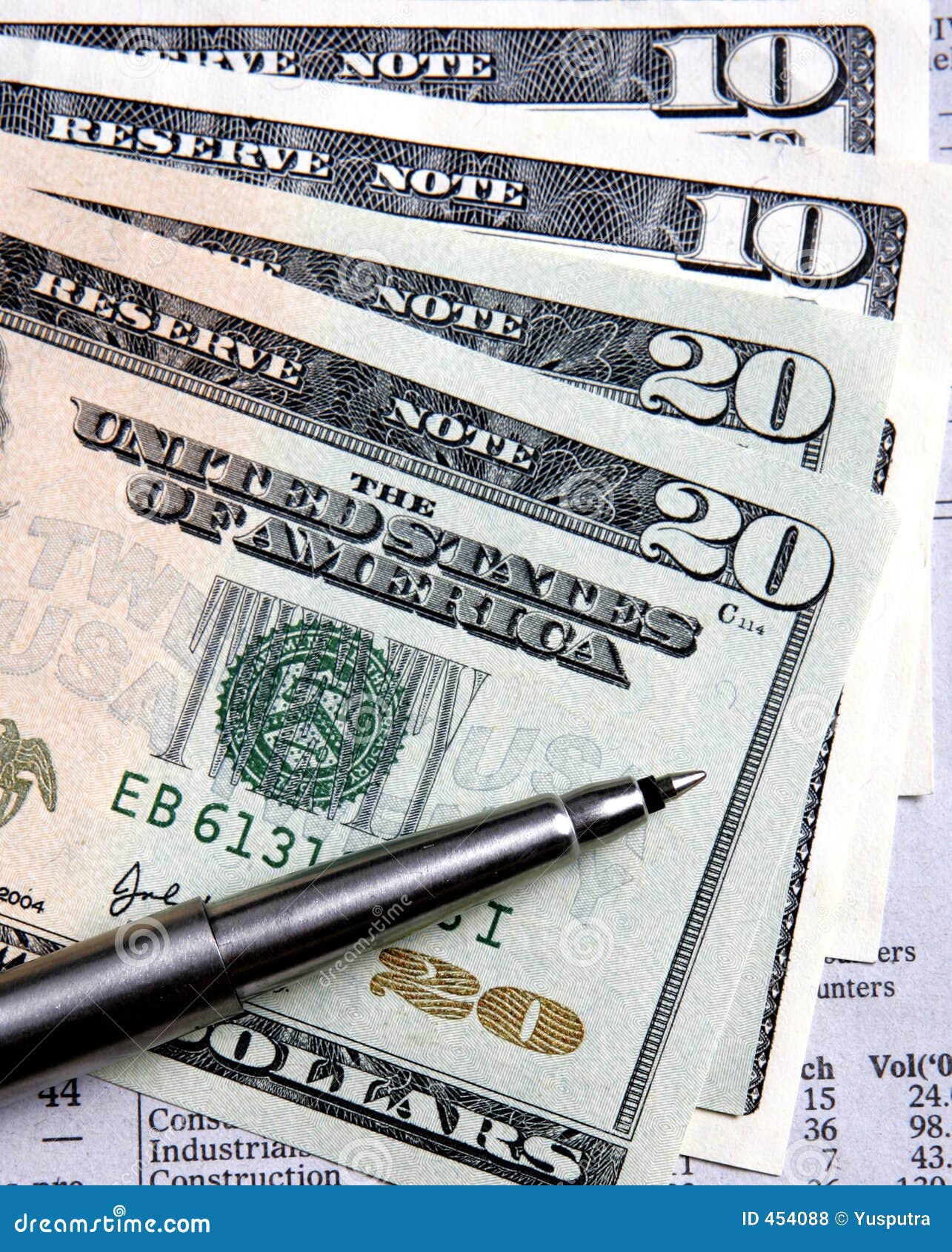 A pen on US currency stock photo. Image of foreign, exchange - 454088
