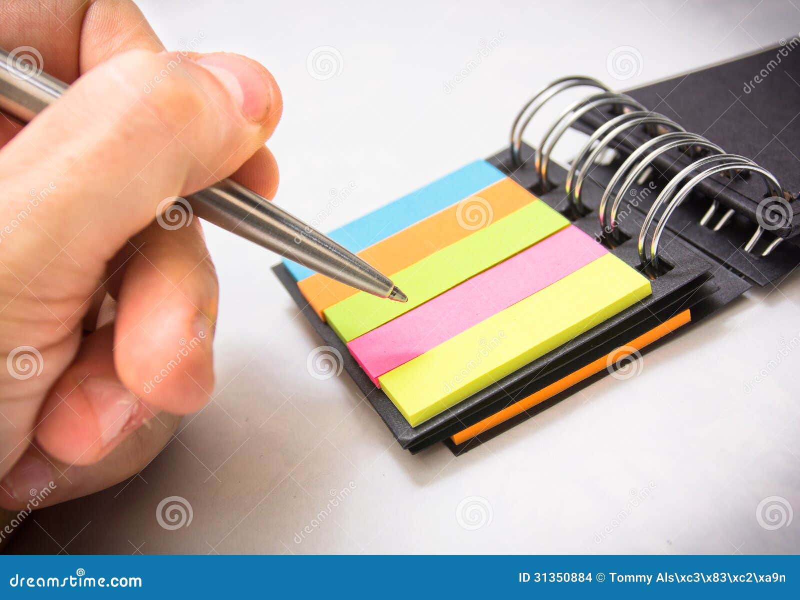 Pen writing on a note stock photo. Image of contacts - 31350884
