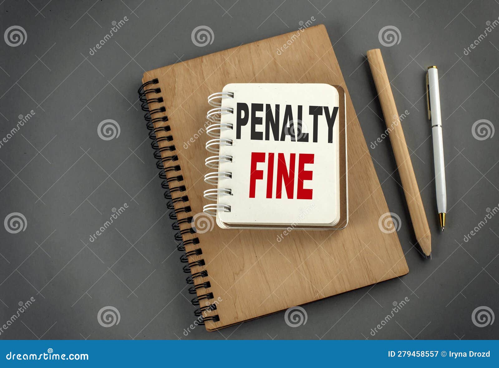 PENALTY FINE Text on Notebook with Pen and Pencil on Grey Background ...