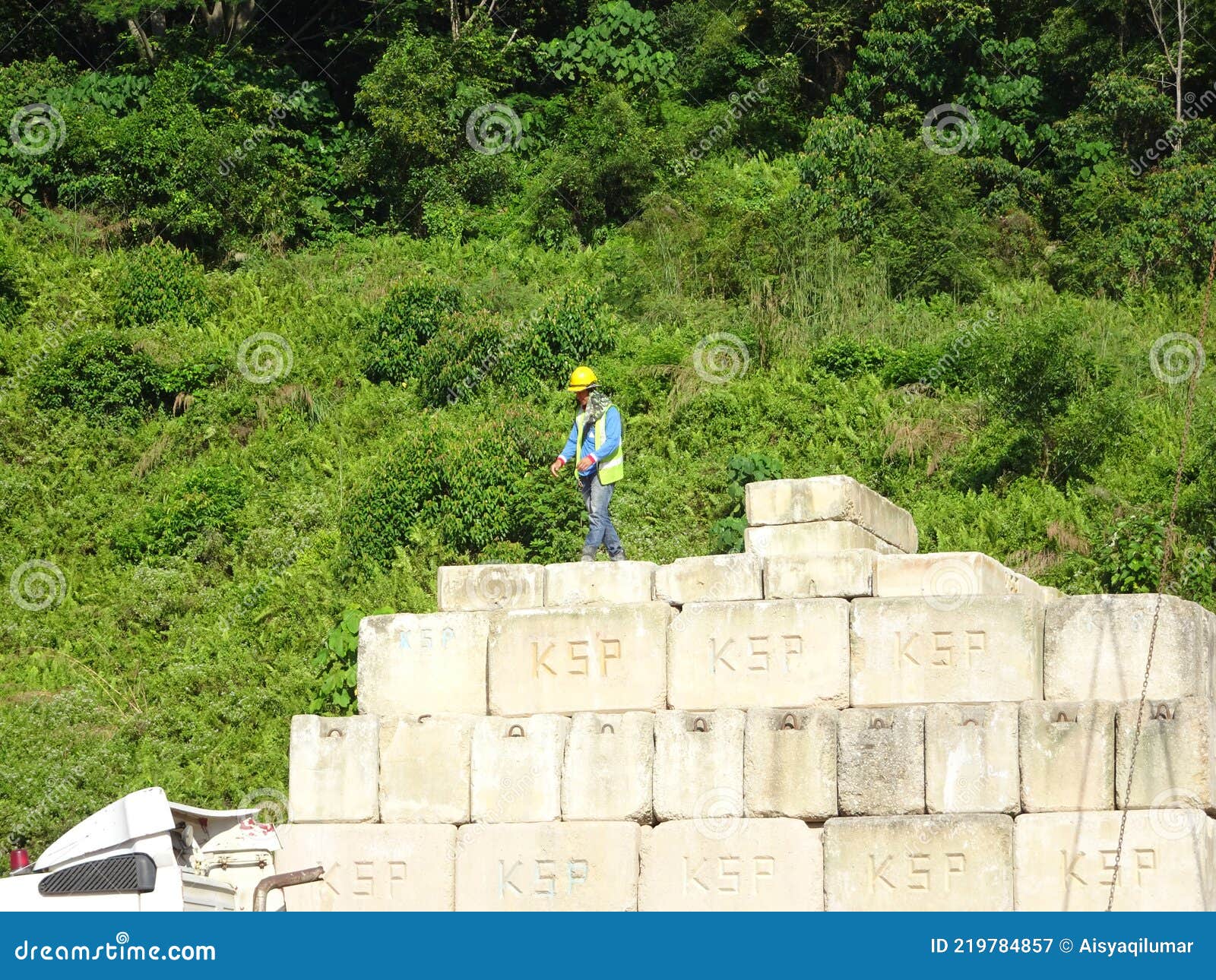Construction Workers Stacking the Maintain Load Test Block Also Known ...
