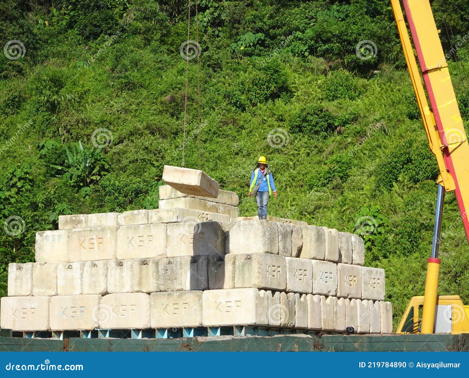 Construction Workers Stacking the Maintain Load Test Block Also Known ...