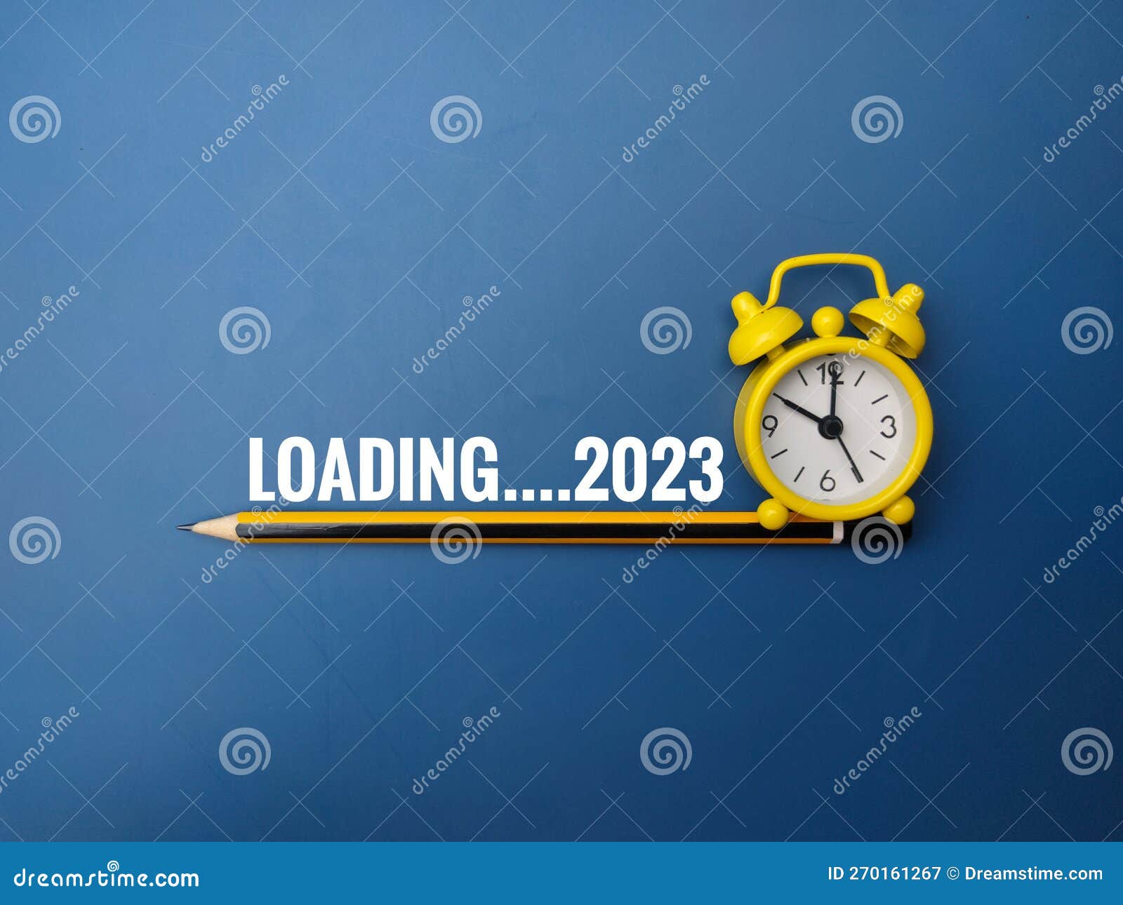 Pencil and Alarm Clock with the Word LOADING 2023 Stock Image - Image ...
