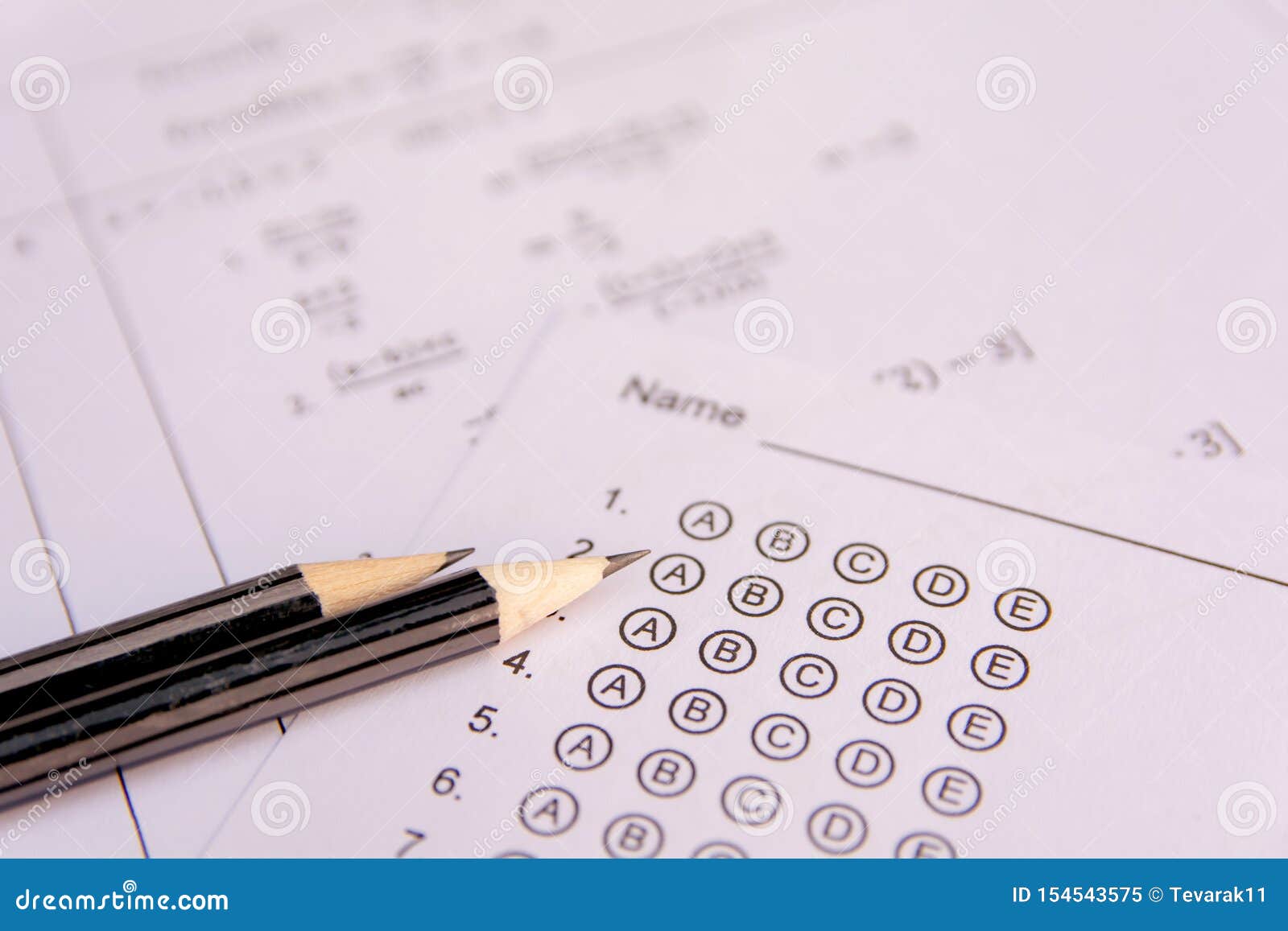 Pencil on Answer Sheets or Standardized Test Form with Answers Bubbled ...