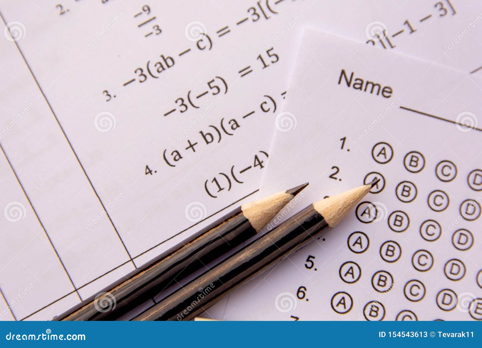 Pencil on Answer Sheets or Standardized Test Form with Answers Bubbled ...