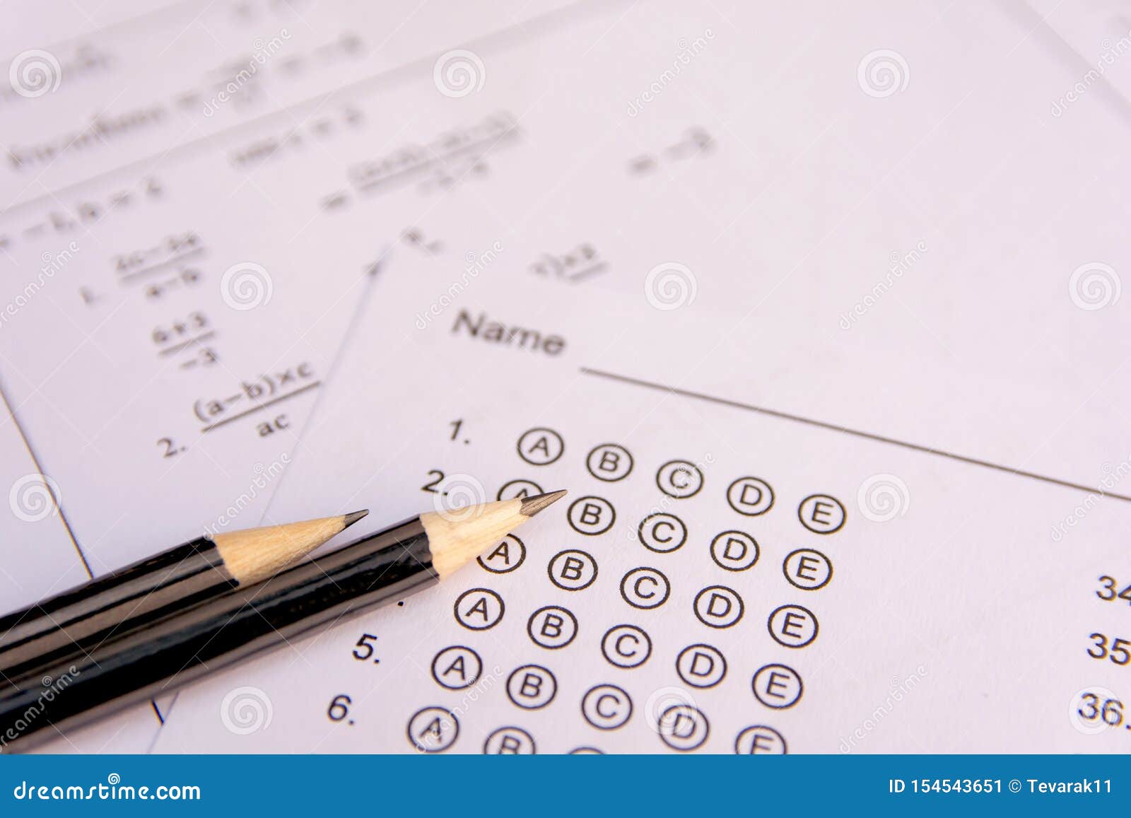 Pencil on Answer Sheets or Standardized Test Form with Answers Bubbled ...