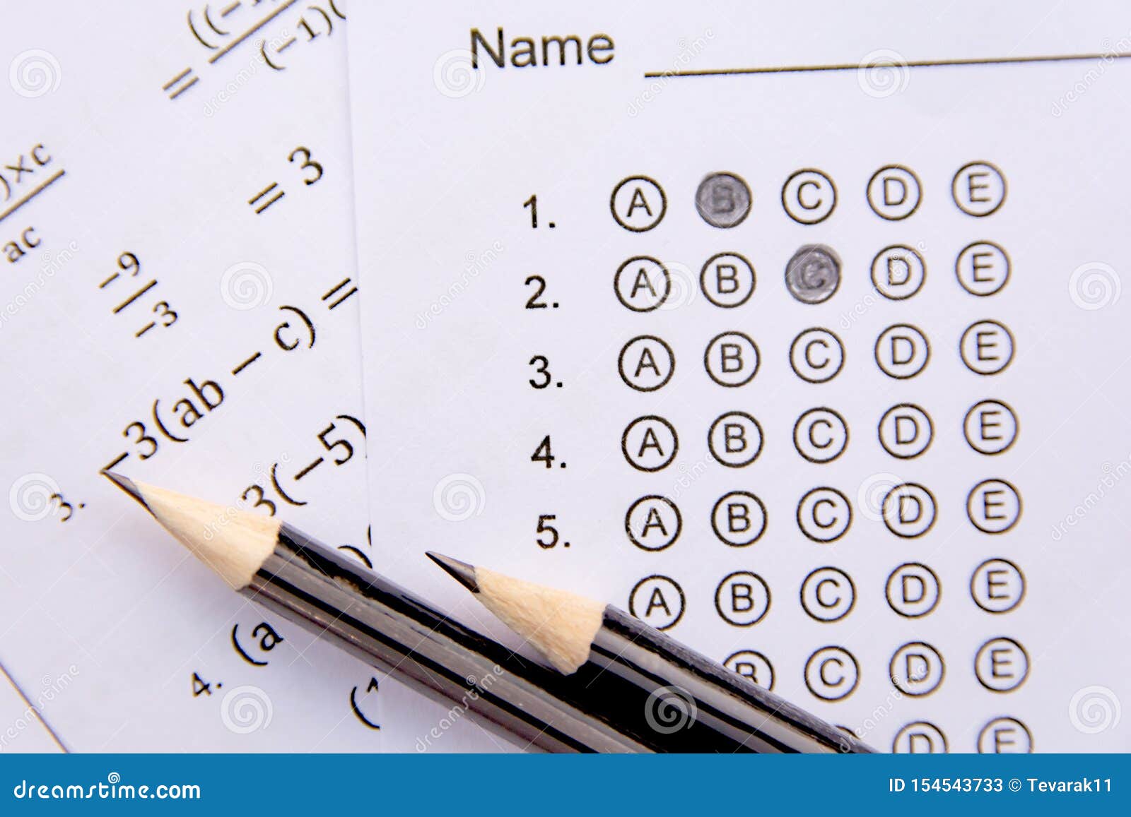 Pencil on Answer Sheets or Standardized Test Form with Answers Bubbled ...