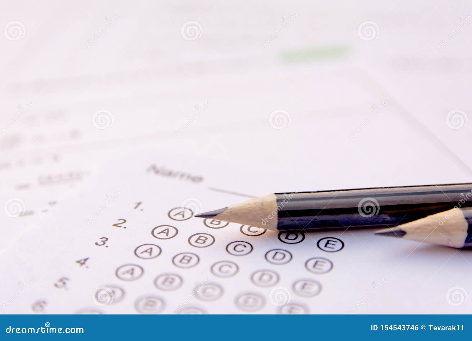 Pencil on Answer Sheets or Standardized Test Form with Answers Bubbled ...