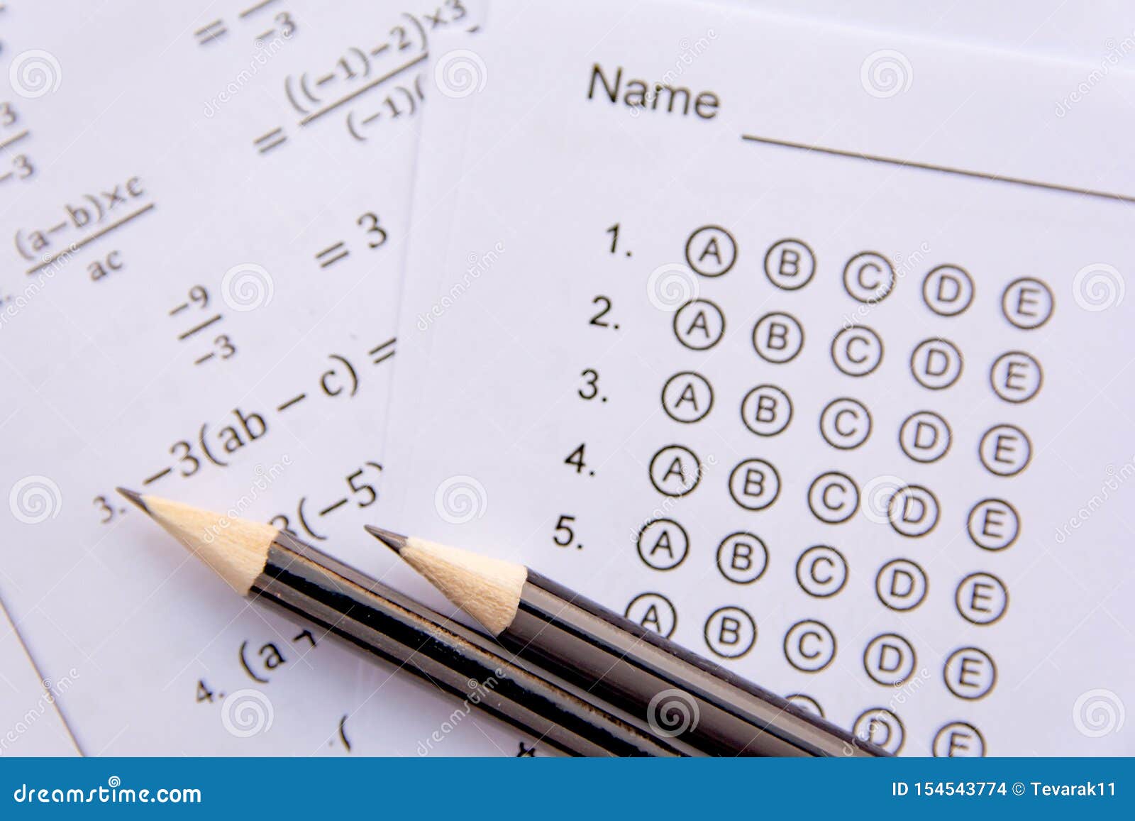 Pencil on Answer Sheets or Standardized Test Form with Answers Bubbled ...