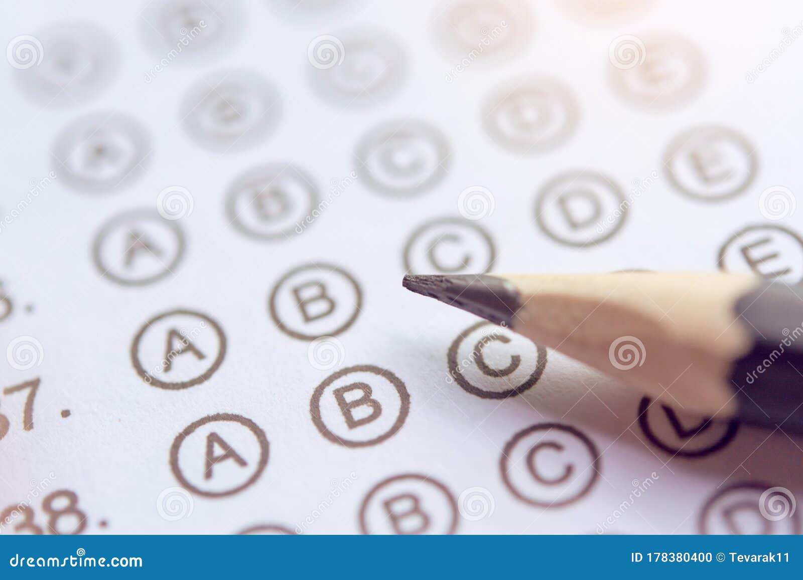 Pencil on Answer Sheets or Standardized Test Form with Answers Bubbled ...