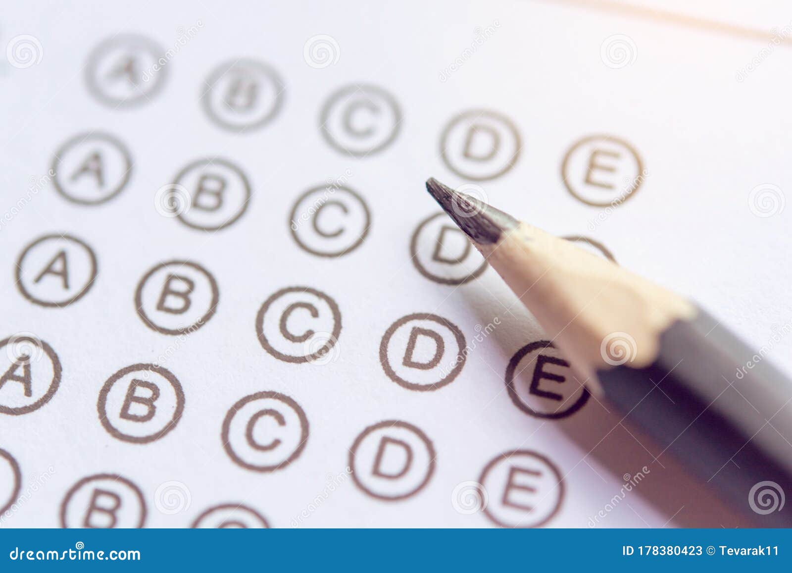 Pencil on Answer Sheets or Standardized Test Form with Answers Bubbled ...