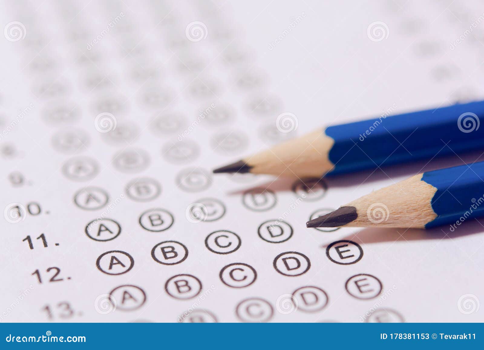 Pencil on Answer Sheets or Standardized Test Form with Answers Bubbled ...