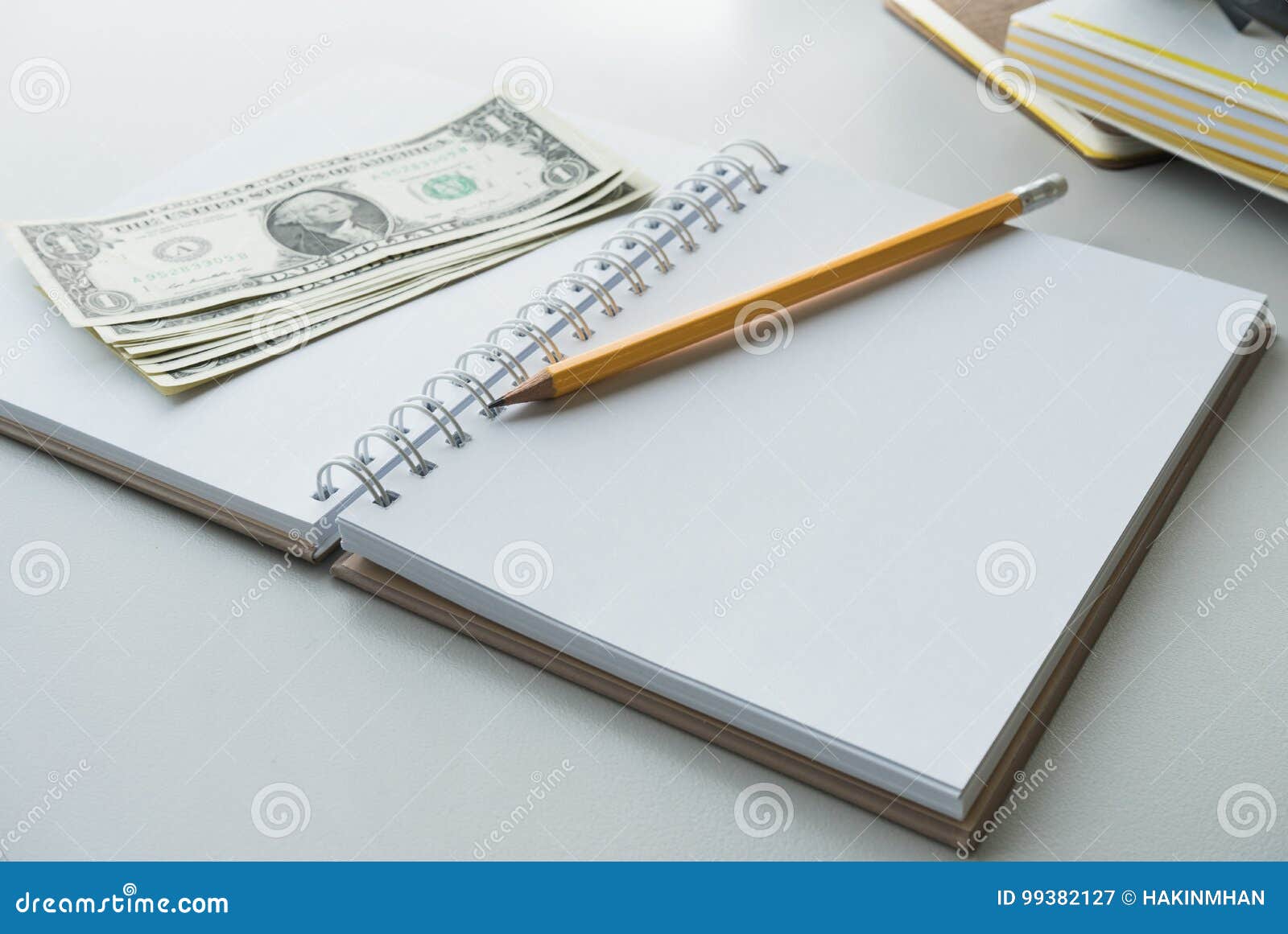 Pencil and Bills Money on Notebook.financial Saving Stock Image - Image ...