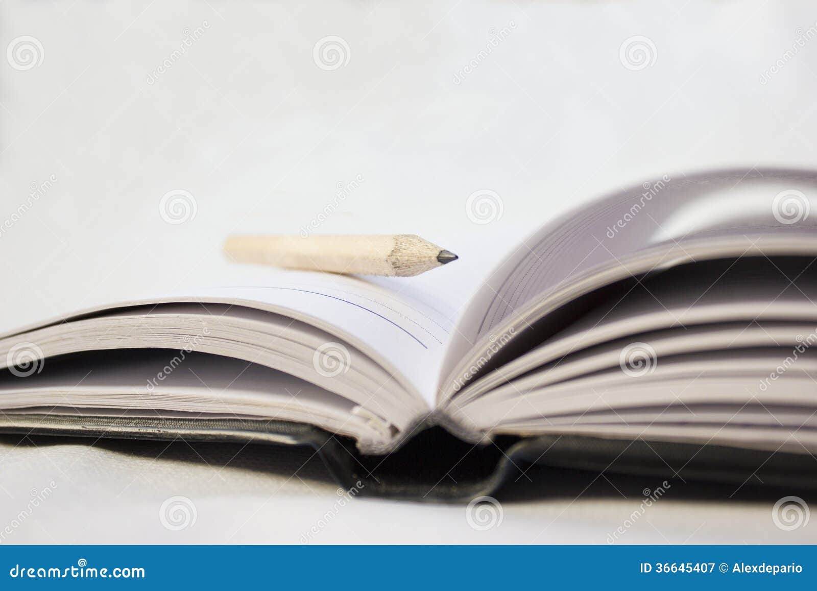 Pencil on a book stock image. Image of document, business - 36645407