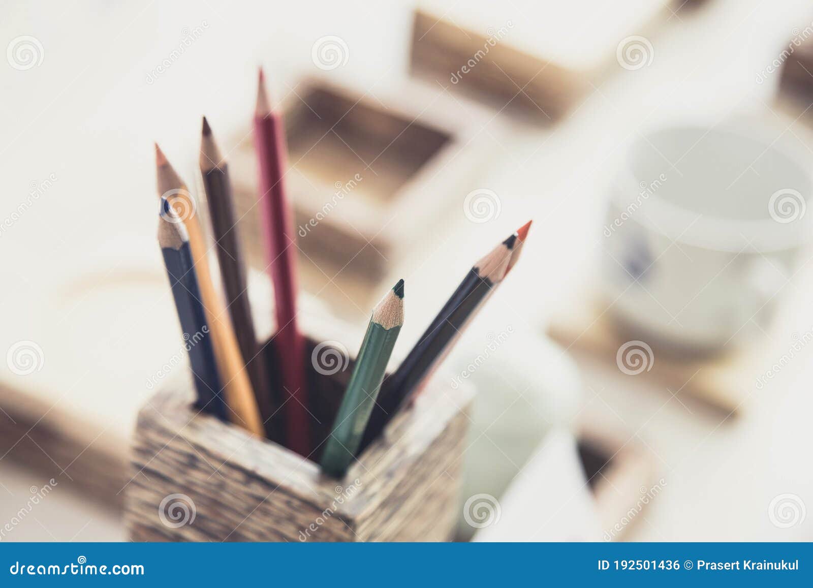 Pencils in the wood bucket stock photo. Image of colorful - 192501436