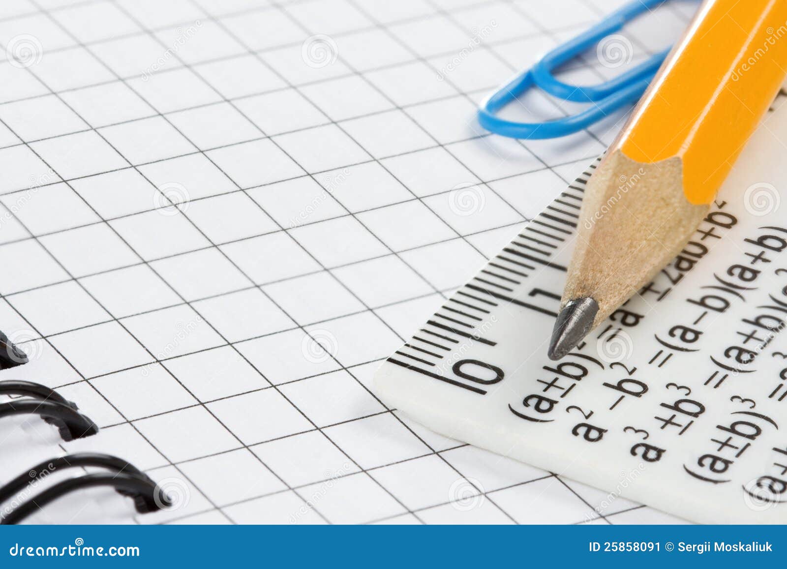 Pencil on checked notebook stock image. Image of accessory - 25858091