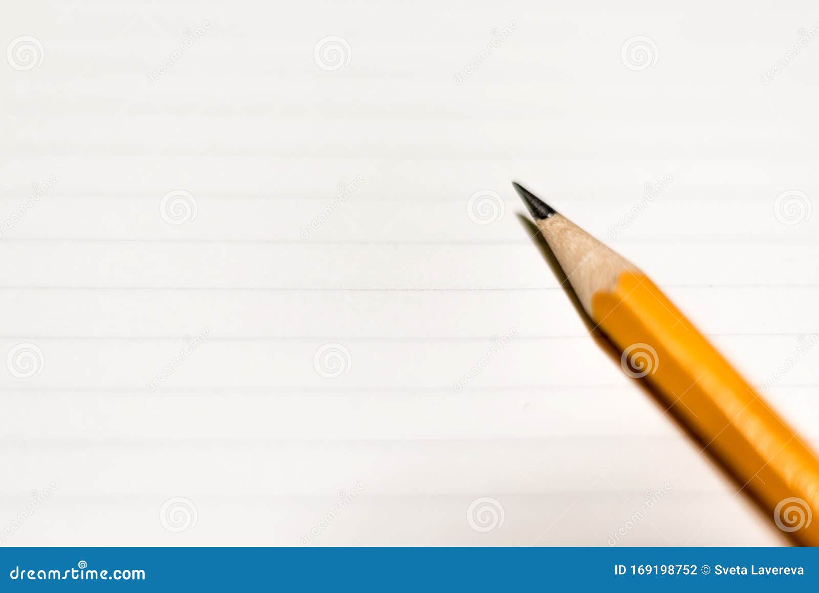 A Pencil on Clean Lined Paper. Stock Photo - Image of document ...