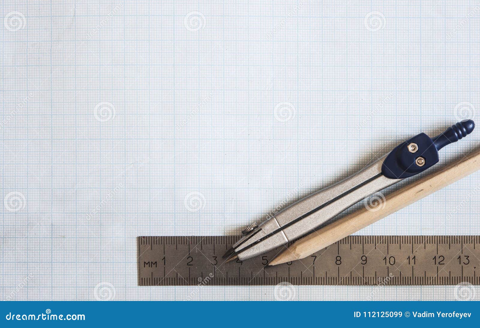 Pencil, Compass and Rulers on Graph Paper Background Stock Image ...