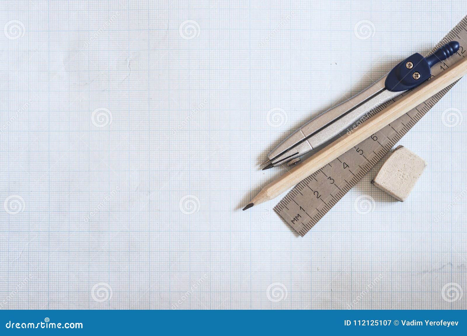 Pencil, Compass and Rulers on Graph Paper Background Stock Image ...