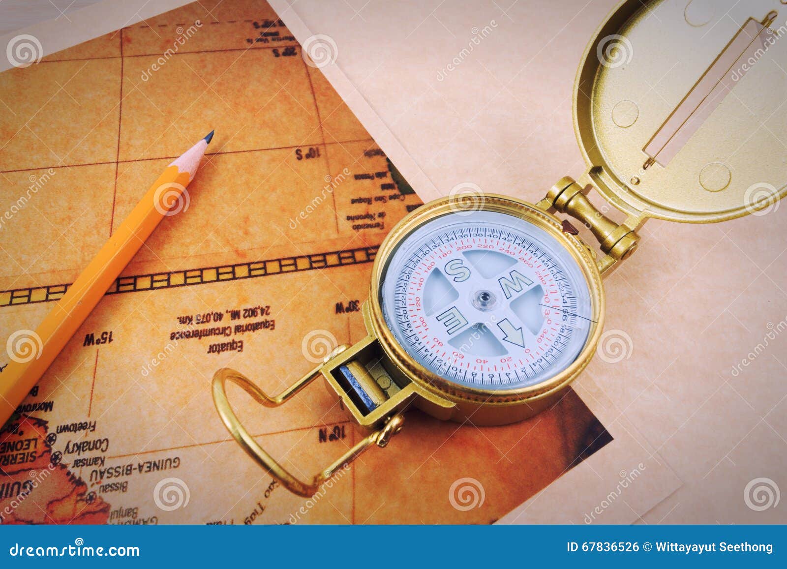 Pencil, Compass and Vintage Map on a Wooden Table. Stock Photo - Image ...
