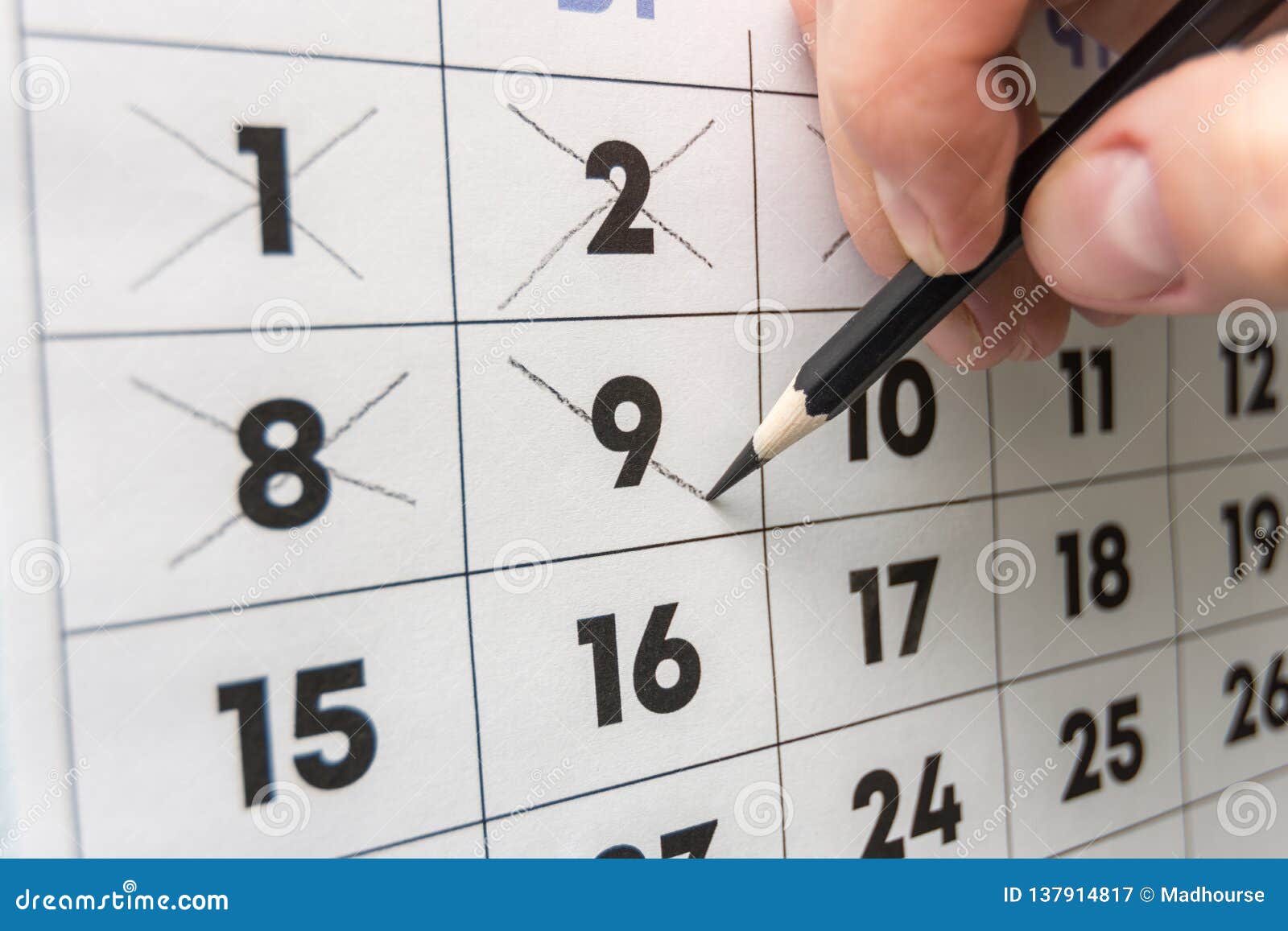 Pencil Crosses Out Dates on the Wall Calendar Stock Image - Image of ...