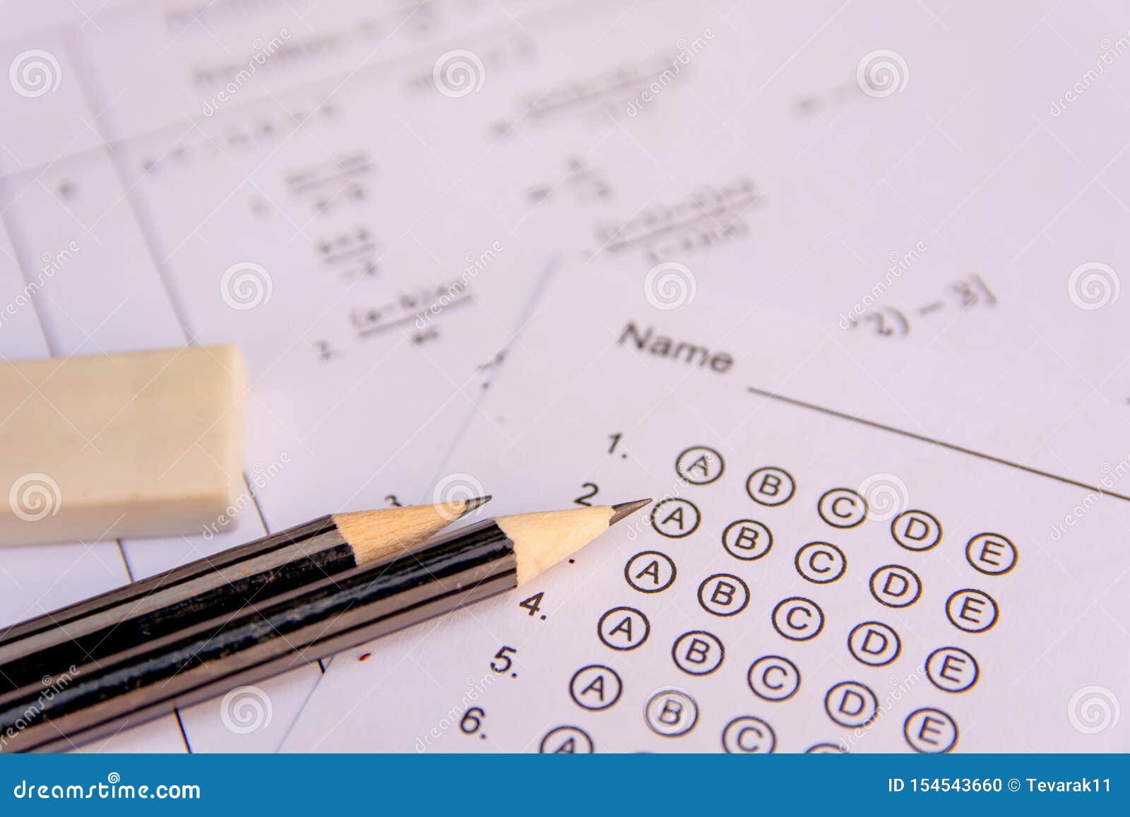 Pencil and Eraser on Answer Sheets or Standardized Test Form with ...