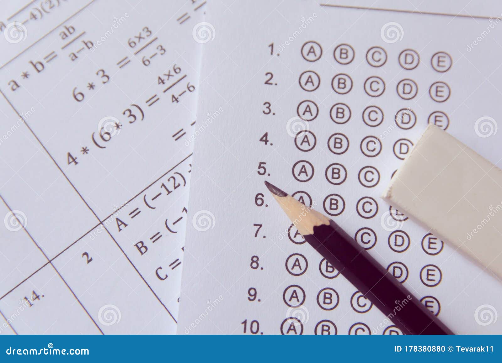 Pencil and Eraser on Answer Sheets or Standardized Test Form with ...