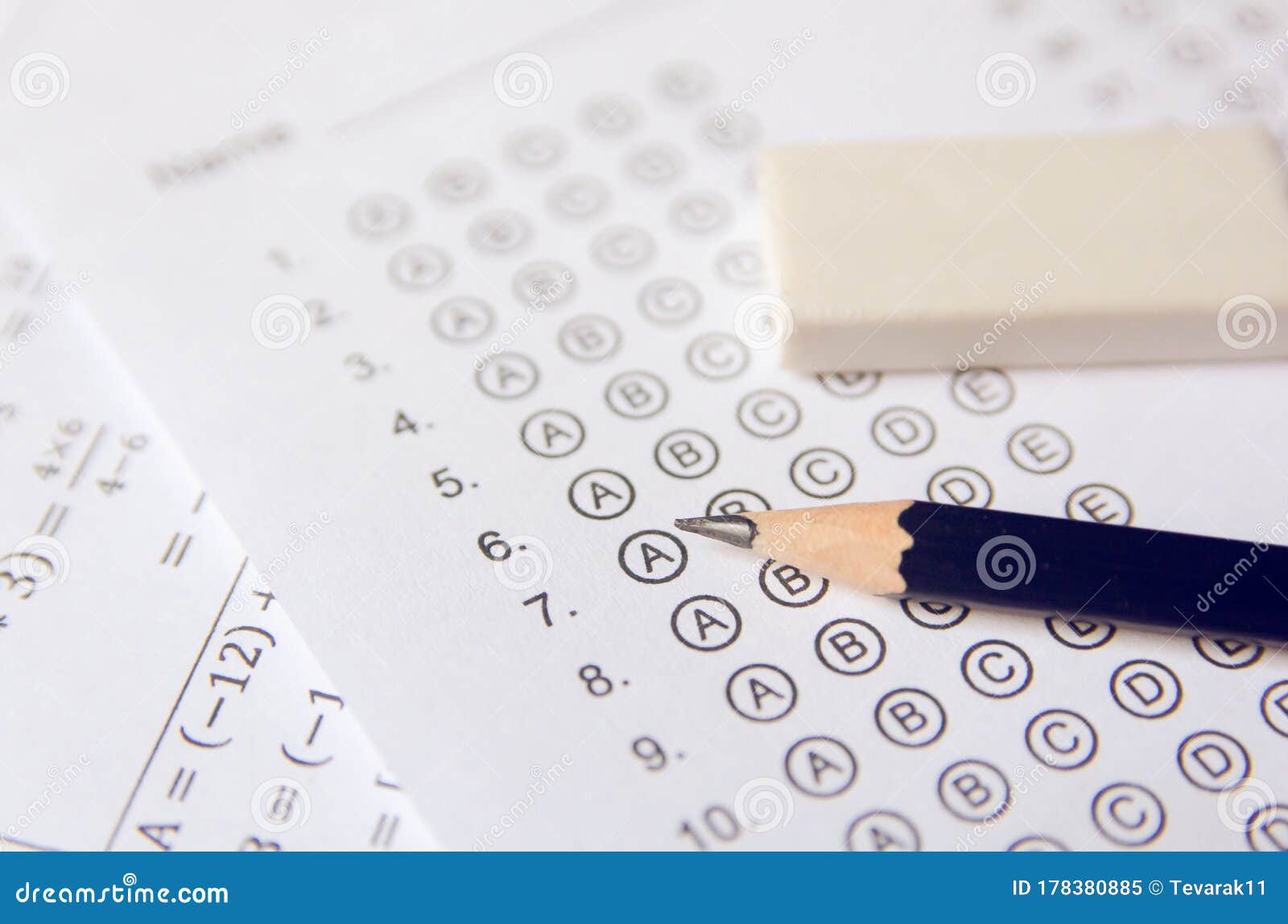 Pencil and Eraser on Answer Sheets or Standardized Test Form with ...