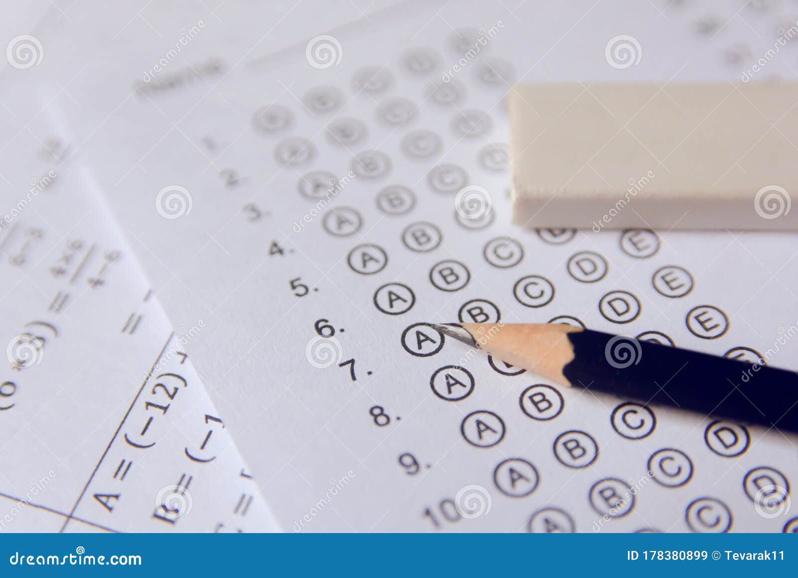 Pencil and Eraser on Answer Sheets or Standardized Test Form with ...