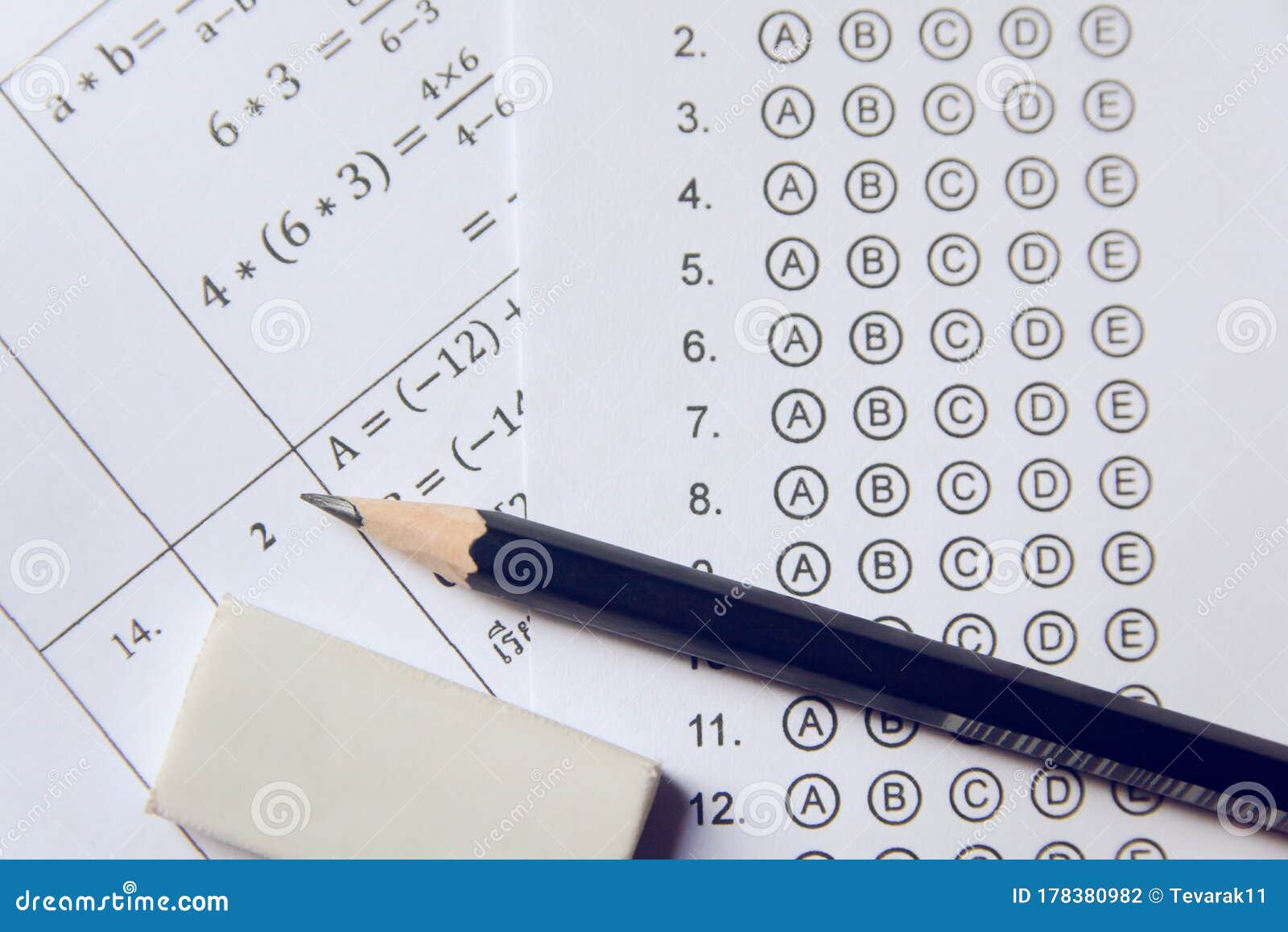 Pencil and Eraser on Answer Sheets or Standardized Test Form with ...