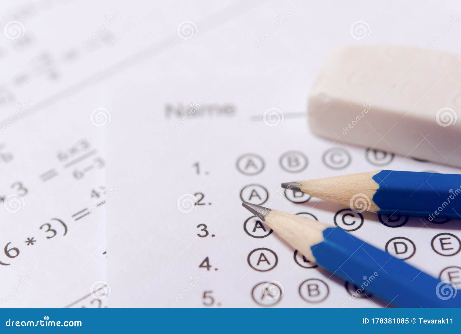 Pencil and Eraser on Answer Sheets or Standardized Test Form with ...