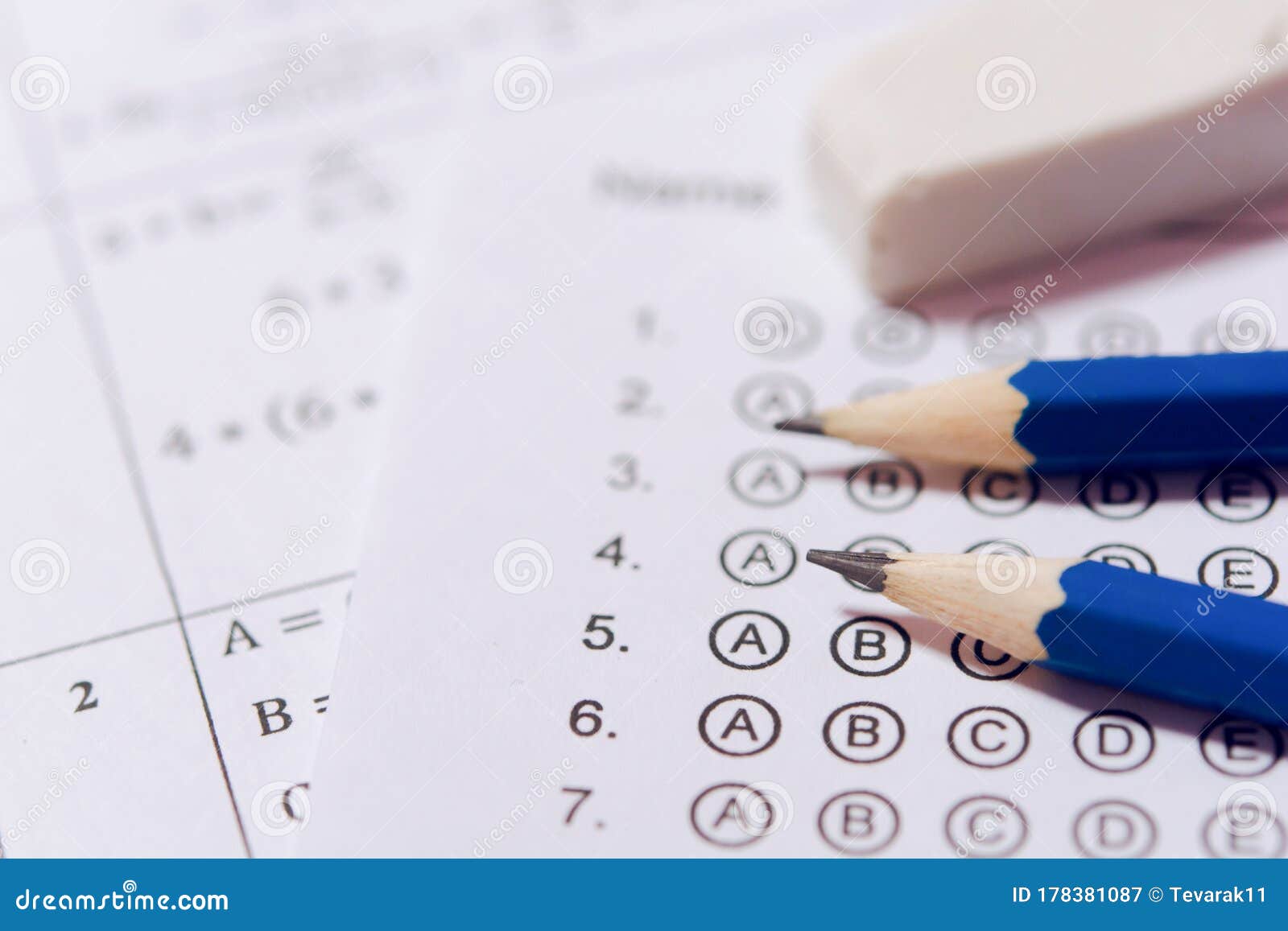 Pencil and Eraser on Answer Sheets or Standardized Test Form with ...