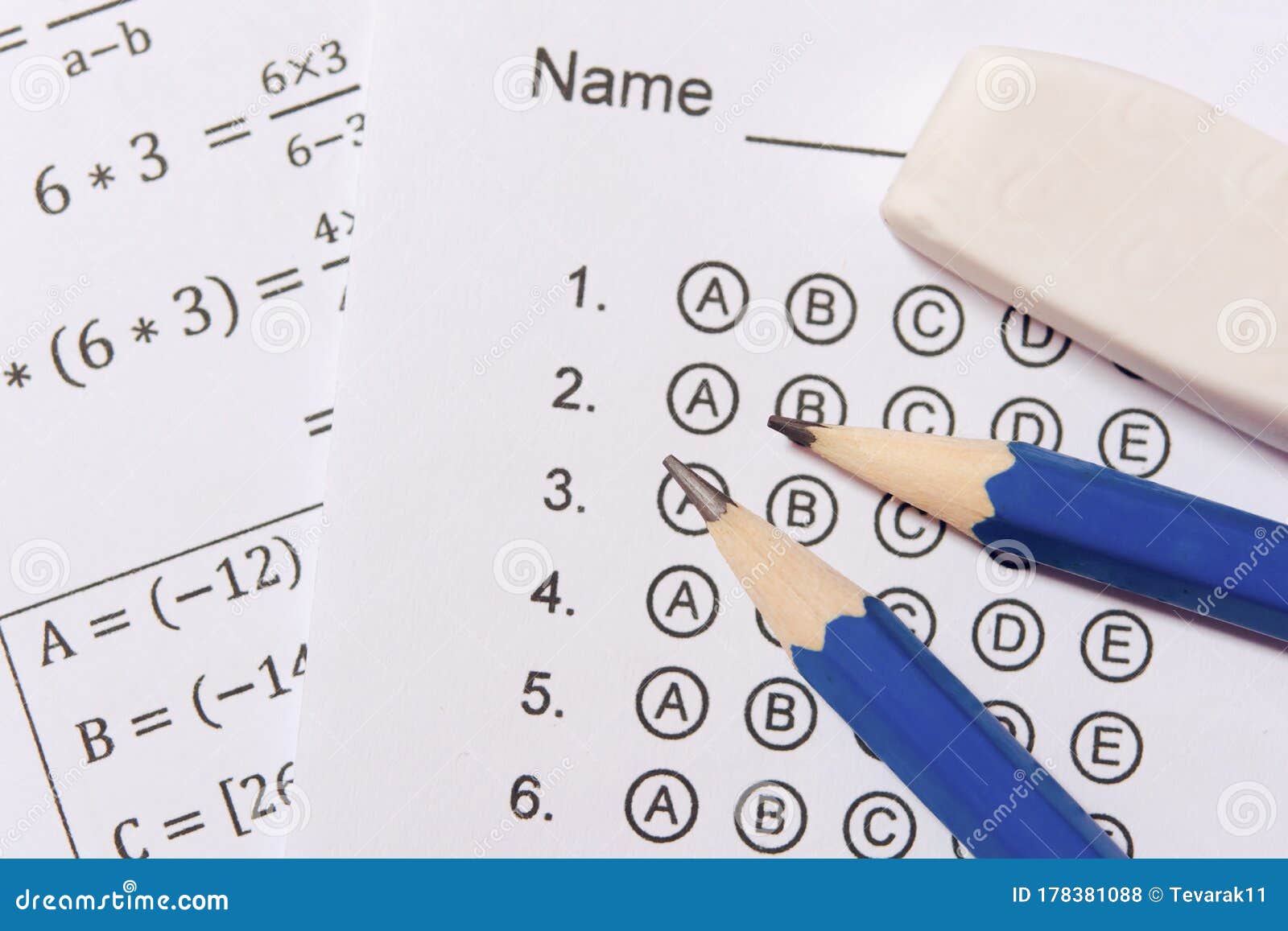 Pencil and Eraser on Answer Sheets or Standardized Test Form with ...