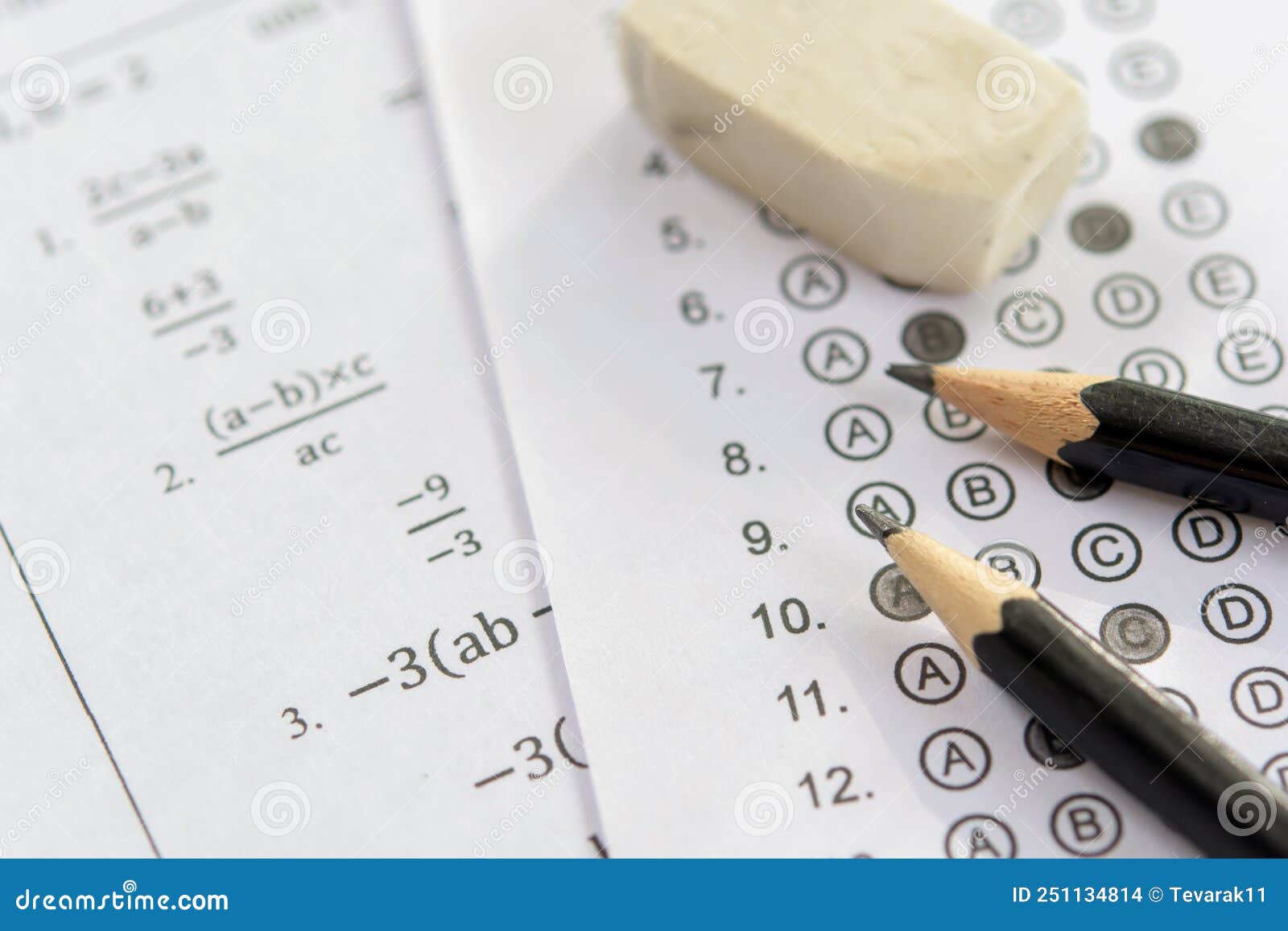 Pencil and Eraser on Answer Sheets or Standardized Test Form with ...