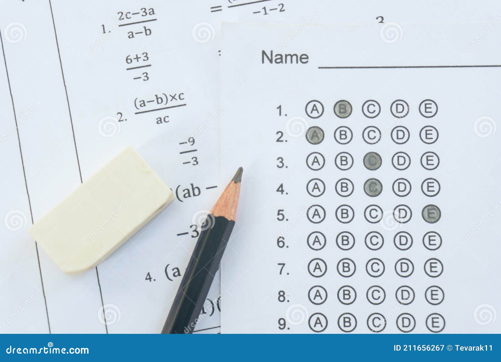 Pencil and Eraser on Answer Sheets or Standardized Test Form with ...