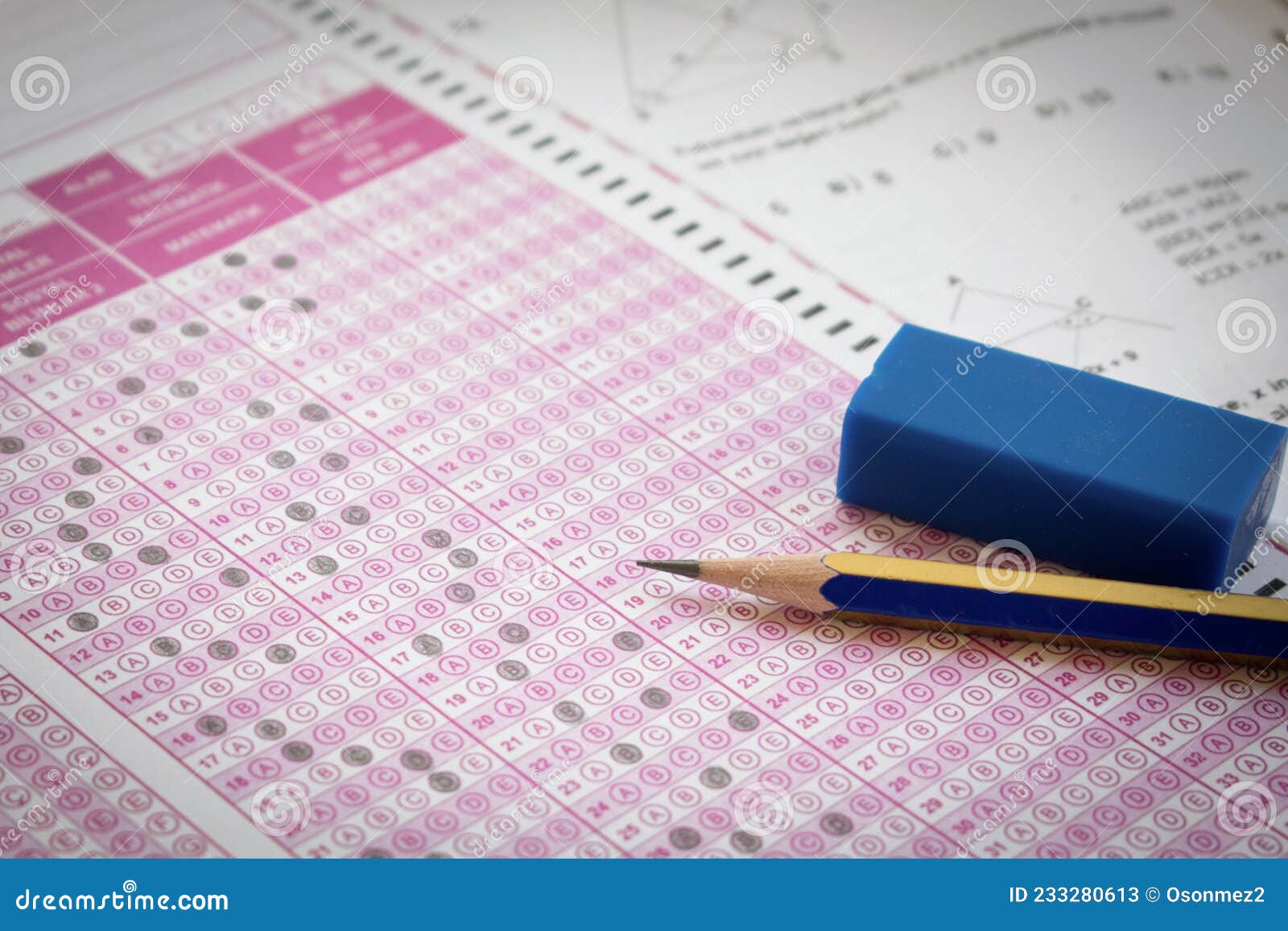 Pencil and Eraser on Test Answer Sheet, with Question Booklet Stock ...