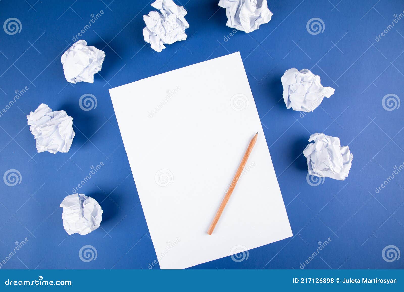 Pencil and paper wads stock photo. Image of crumple - 217126898
