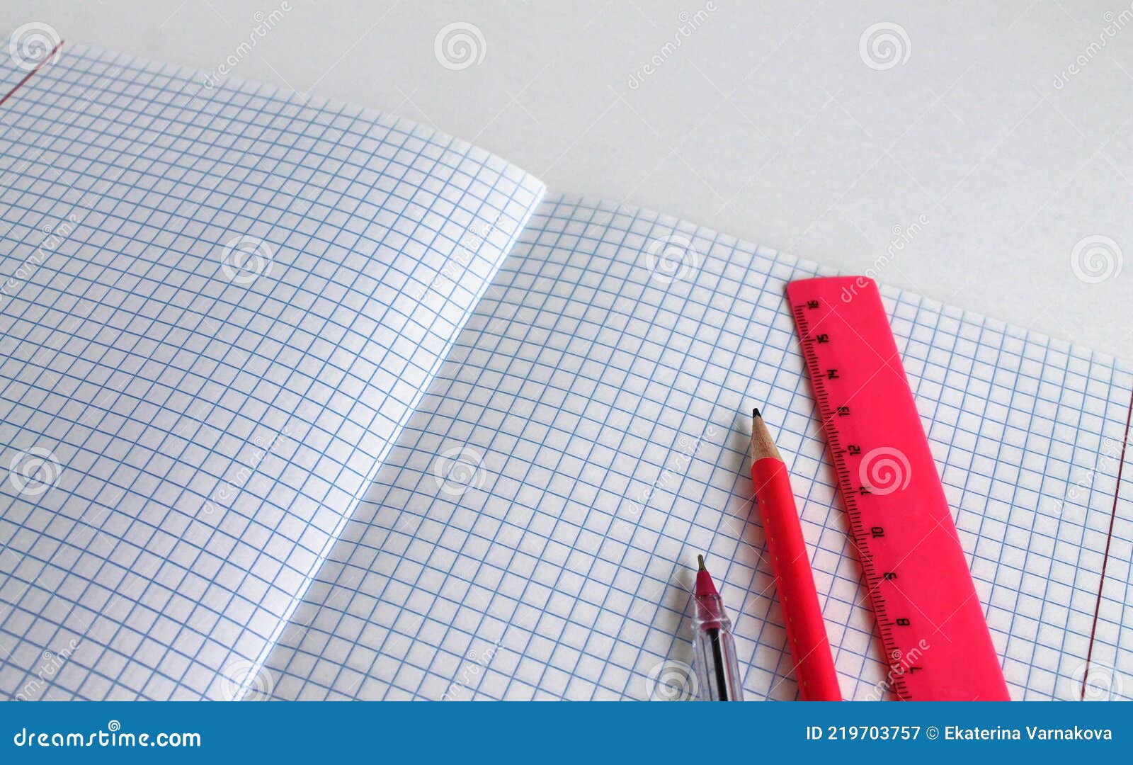 Pencil, Pen And Ruler Lie On Open Notebook In Cage Royalty-Free Stock ...