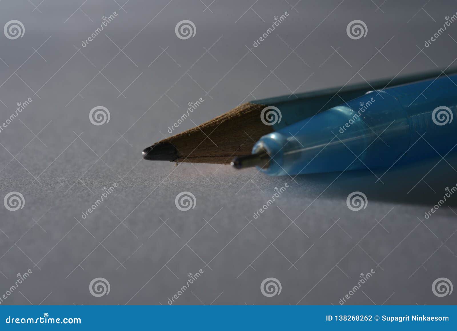 Pencil and Pen in the Shadow Stock Photo - Image of paper, white: 138268262