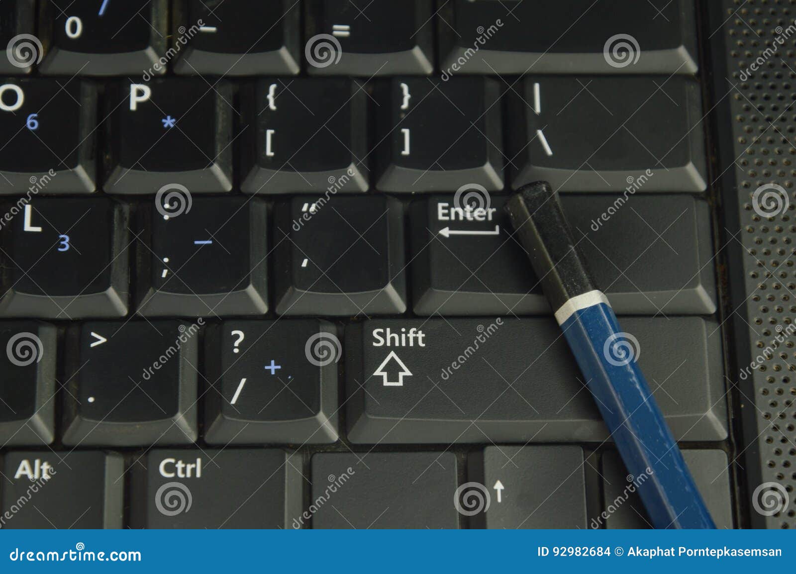 Pencil Pointing Enter Button on Computer Notebook Keyboard Stock Photo ...