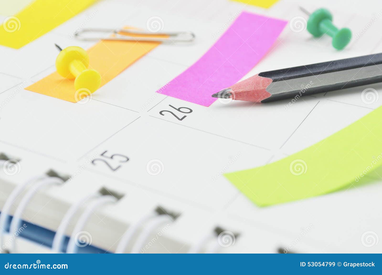 Pencil with Post it Notes and Pin on Business Diary Page Stock Image ...