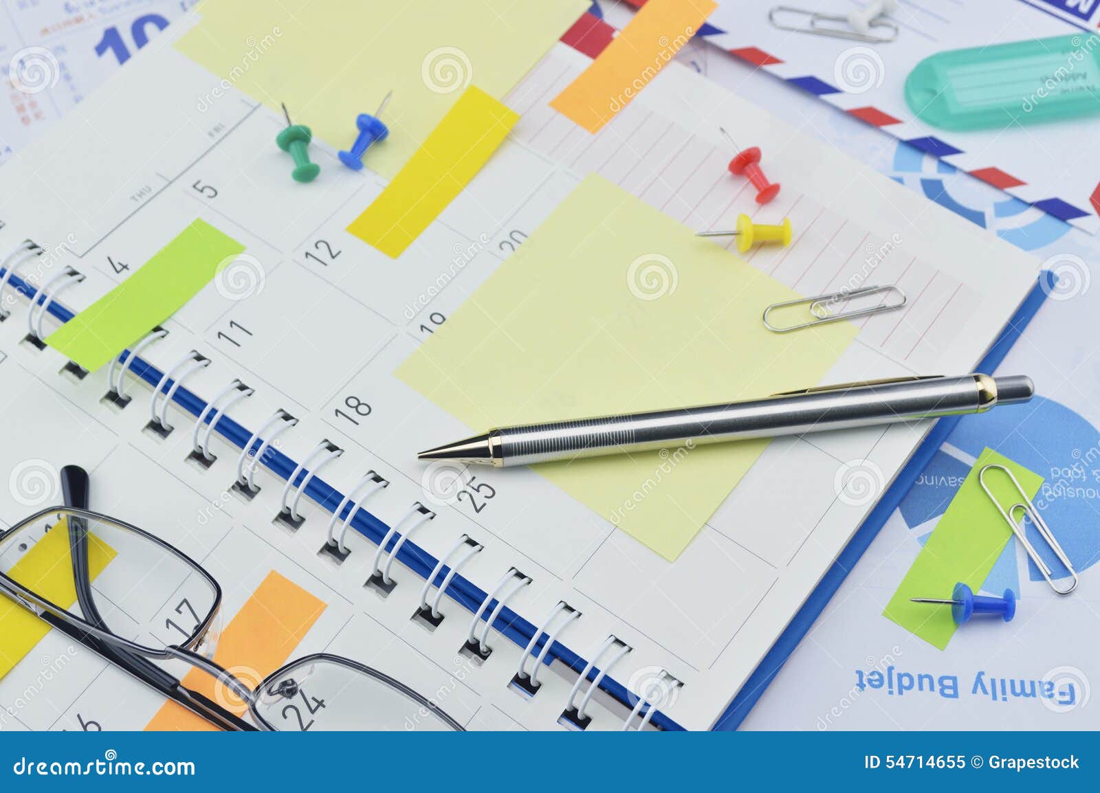 Pencil with Post it Notes and Pin on Business Diary Page Stock Image ...