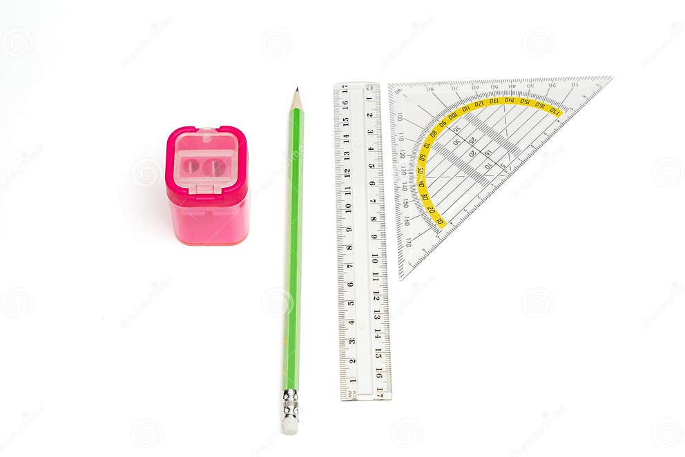 A Pencil, a Ruler, and a Pencil Sharpener are on a White Background ...