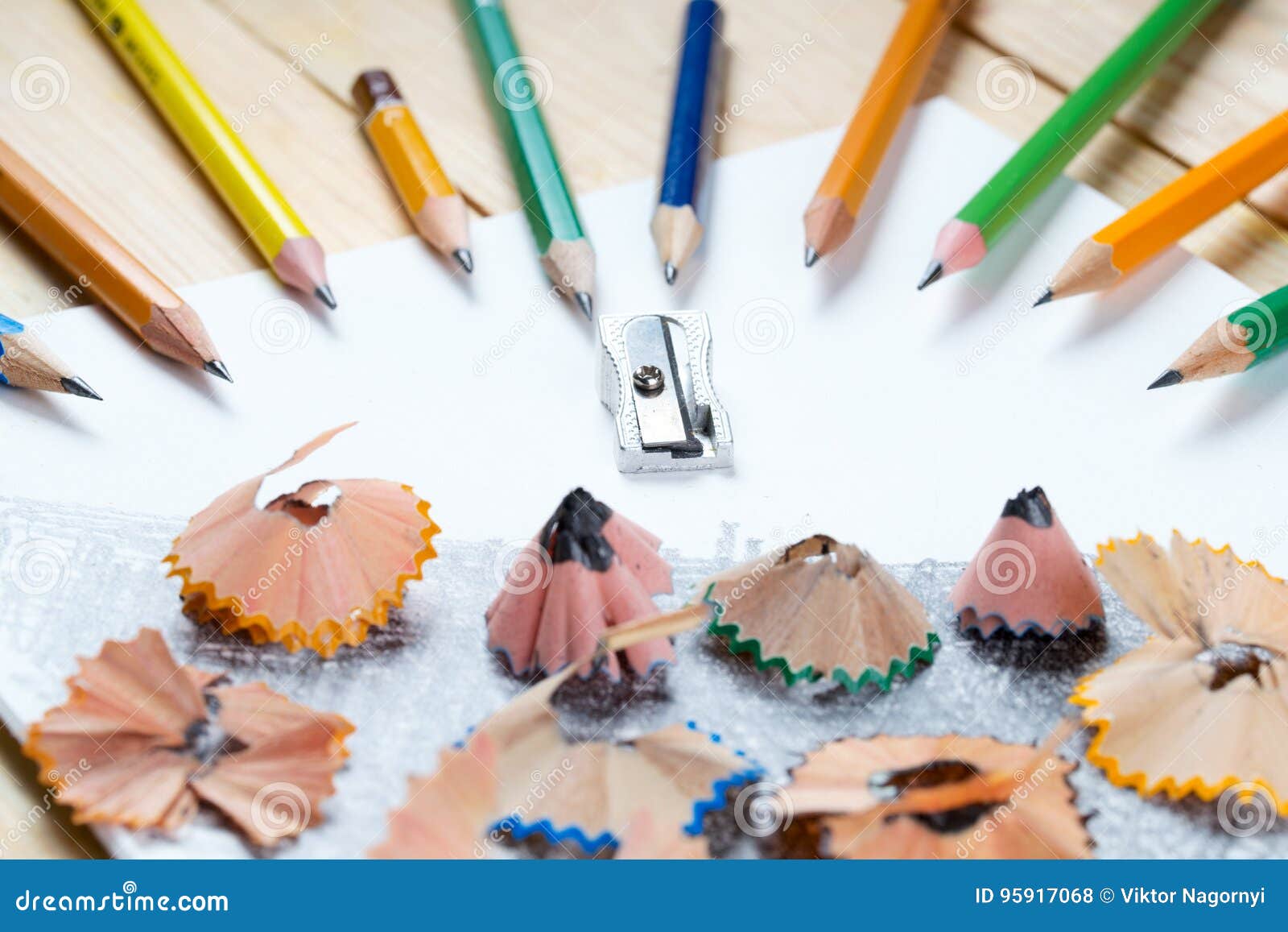 Pencil Sharpener Shavings on the White Paper. Back To School Stock ...