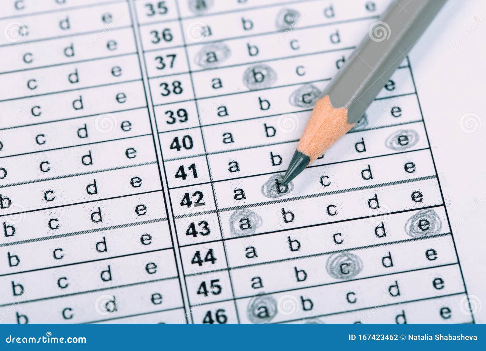 A Pencil Sitting on a Test Bubble Sheet Stock Photo - Image of bubble ...